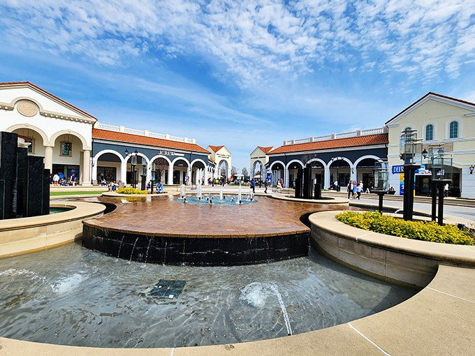 The iconic cylindrical entrance to Tanger Outlets stands like a retail lighthouse, beckoning bargain hunters to the shores of discount paradise.