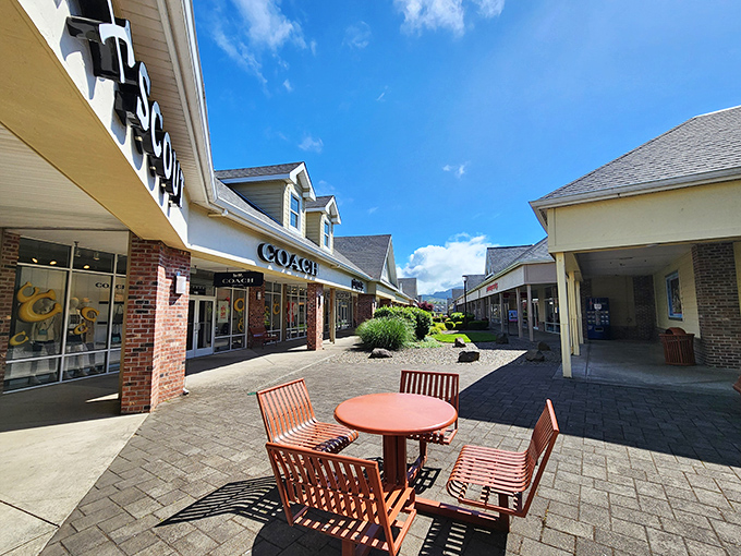The coastal architecture of Lincoln City Outlets creates a shopping village vibe where bargain hunting feels less like a mission and more like a pleasure cruise.