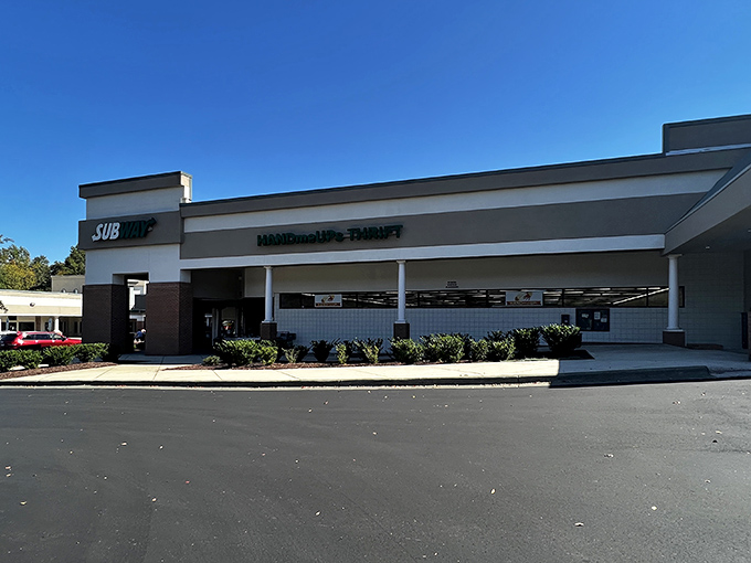 The unassuming storefront of HandmeUPs Thrift stands ready to transform bargain hunters into treasure collectors. Retail therapy without the financial guilt!