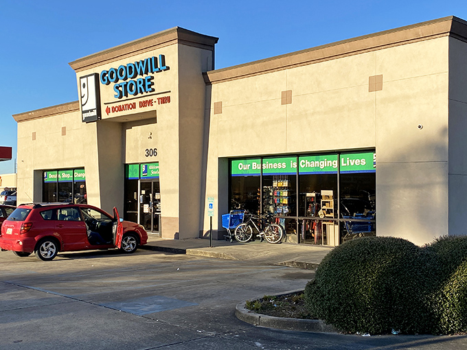 The beige exterior might not scream "retail excitement," but inside this unassuming Goodwill lies a treasure trove that would make Indiana Jones switch careers.