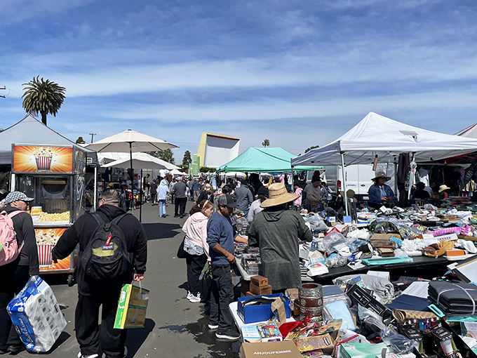 Weekend warriors navigate the labyrinth of pop-up tents and tables, where one person's decluttered closet becomes another's fashion statement.