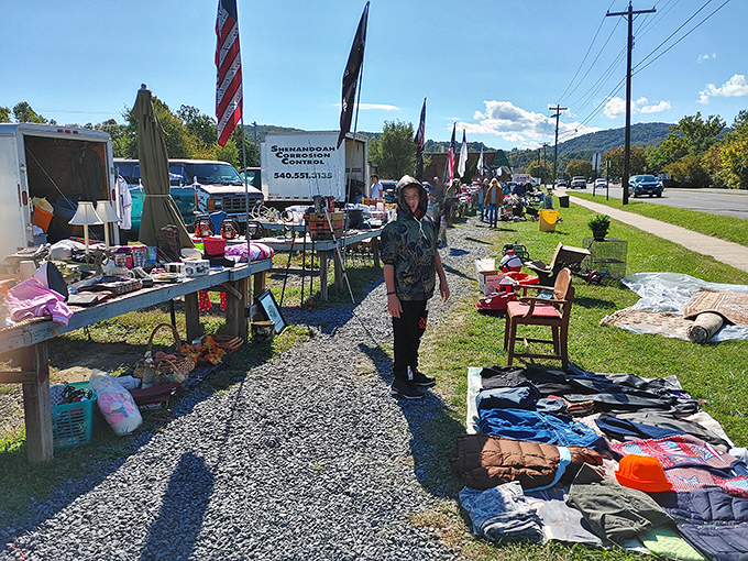 Treasure hunting begins on this gravel path lined with American flags and everyday artifacts waiting for their second chance at usefulness.
