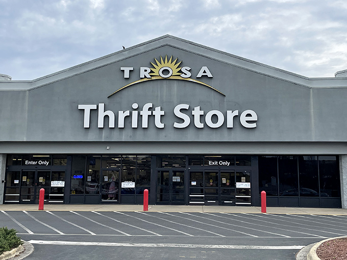 The TROSA Thrift Store's iconic storefront promises treasure hunting adventures behind those "Enter Only" doors, where bargains await like old friends.