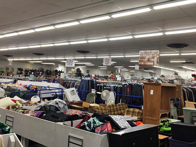 A thrifter's paradise stretches as far as the eye can see. The blue railings guide you through departments like Virgil leading Dante through retail purgatory.