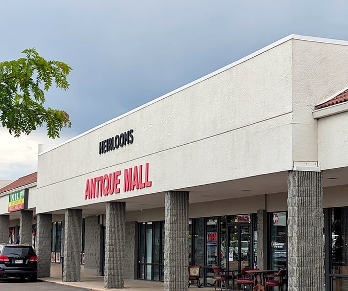 The unassuming exterior of Heirlooms Antique Mall in Aurora hides a universe of vintage treasures waiting to be discovered inside.