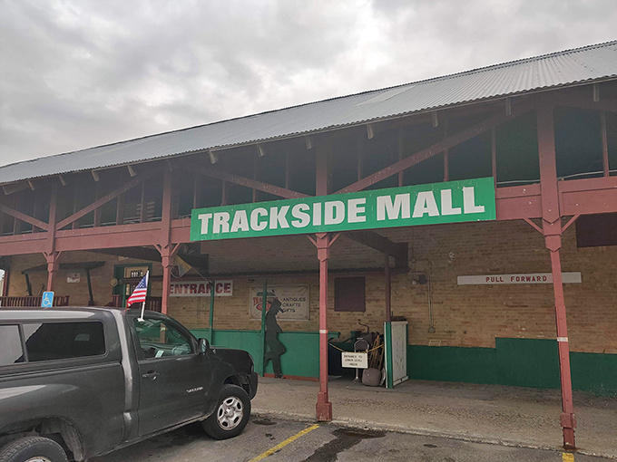 The pink pillars and green signage of Trackside Mall stand like sentinels guarding treasures within. Idaho's answer to Aladdin's cave awaits just beyond those doors.