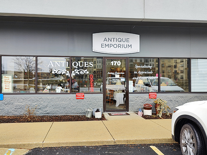 The unassuming storefront of Antique Emporium in Carmel beckons treasure hunters with promises of nostalgic discoveries waiting just beyond those doors.