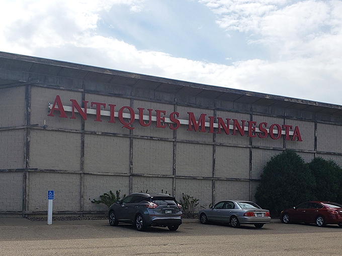 The bold red lettering against concrete gray isn't just signage&mdash;it's a beacon calling to collectors and nostalgia-seekers alike.