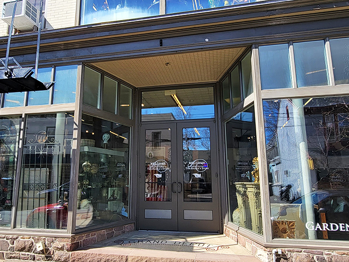 Glass doors beckon curious shoppers into a world where yesterday's treasures await new homes. The entrance alone hints at the wonderland inside.