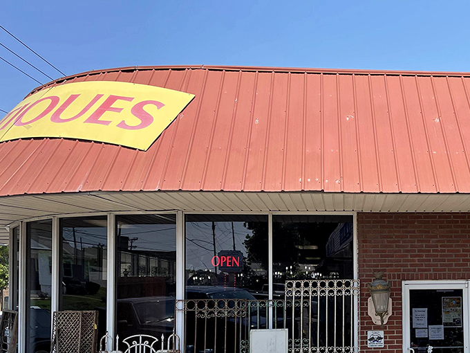 That iconic red roof and bold yellow "ANTIQUES" sign &ndash; the universal bat signal for treasure hunters everywhere. Come in, the past is calling!