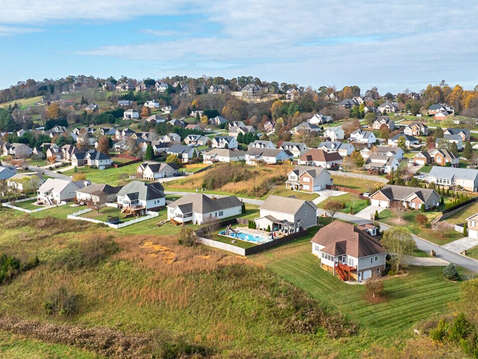 Rolling hills cradle Johnson City's residential neighborhoods like a patchwork quilt, where suburban comfort meets mountain majesty in perfect harmony.