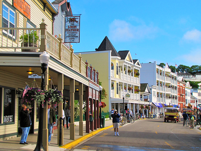 Main Street's colorful Victorian storefronts create the perfect backdrop for a car-free paradise where bicycles and horse-drawn carriages rule the road.
