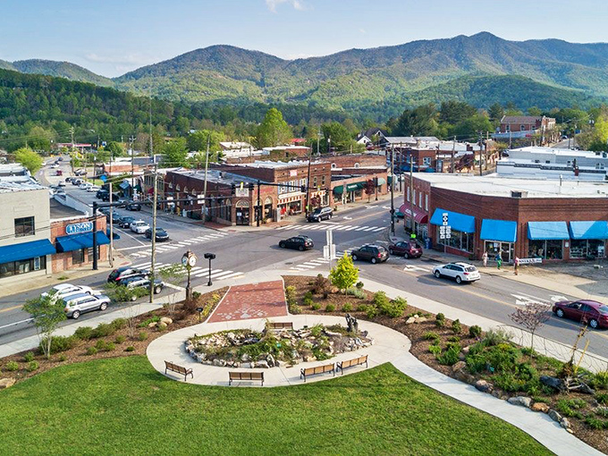 Downtown Black Mountain beckons with its charming brick storefronts and mountain backdrop. Small-town magic with big-time views.