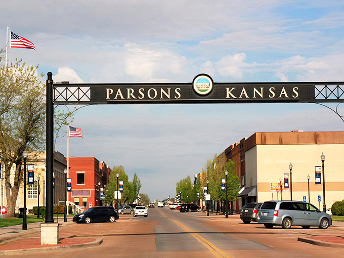 Another view of the welcoming arch spanning Main Street&mdash;where your retirement dollars can finally breathe a sigh of financial relief.