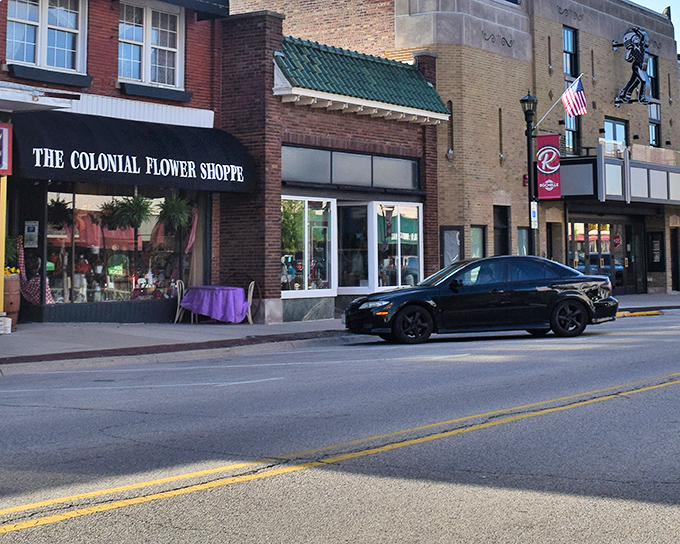 Downtown Lincoln offers small-town charm with shops like The Colonial Flower Shoppe, where window displays rival Broadway set designs.
