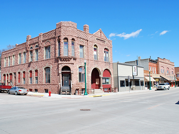 The pink quartzite castle-like building stands as Dell Rapids' signature landmark, a Victorian-era beauty that seems plucked from a European fairytale.