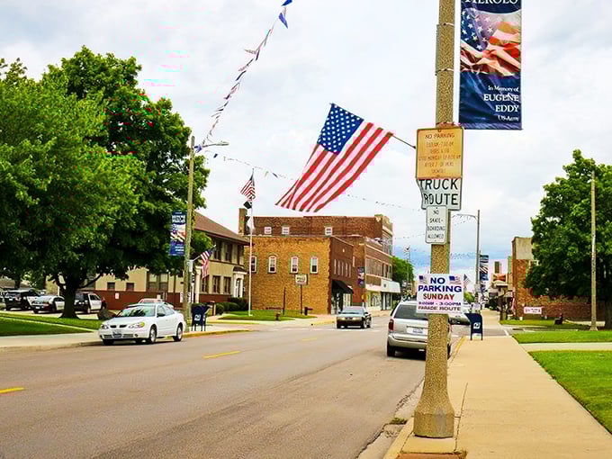 American flags wave proudly over downtown, reminding you that small-town pride never goes out of style here.