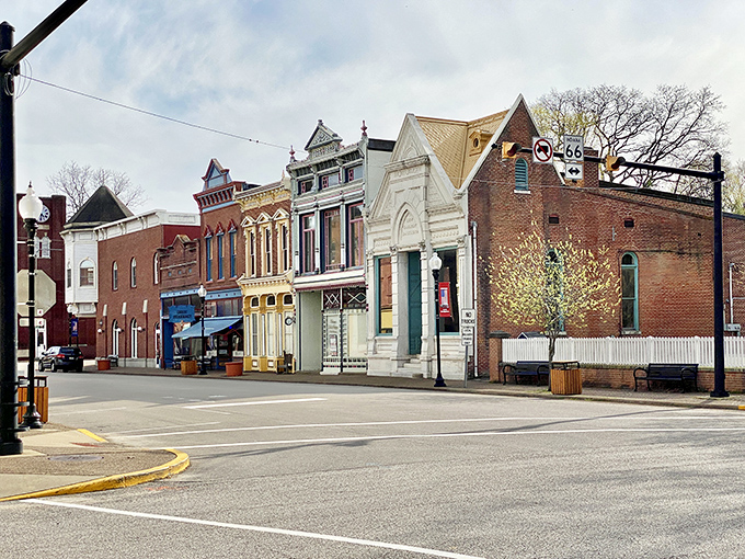 Historic storefronts line New Harmony's main thoroughfare like a perfectly preserved film set where modern life continues within 19th-century architecture.