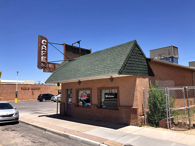 The stucco exterior of Brown Mug Cafe stands like a culinary lighthouse on Winslow's horizon, beckoning hungry travelers with promises of Mexican-American comfort.