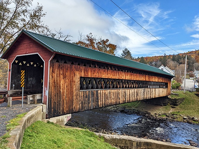 Mother Nature frames this historic span perfectly, with autumn hills creating a backdrop worthy of a New England postcard.