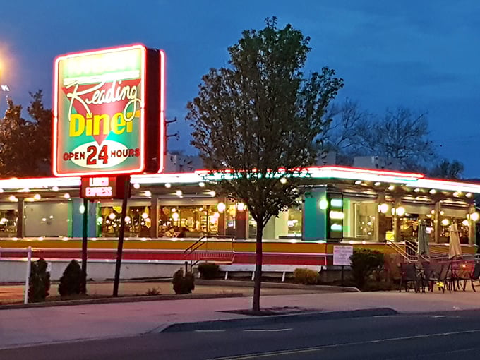 The Reading Diner's neon sign glows like a beacon of hope for hungry travelers. At dusk, it transforms into a Edward Hopper painting come to life.