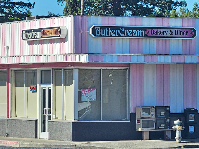 The pink and white striped exterior of Butter Cream Bakery & Diner stands out like a beacon of sweetness in Napa, promising nostalgic comfort before you even step inside.
