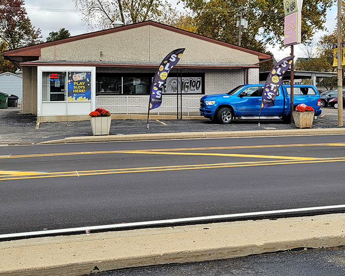 A roadside view that screams "Americana" &ndash; complete with gaming signs and those fluttering flags that say "yes, we're definitely open and ready to feed you."