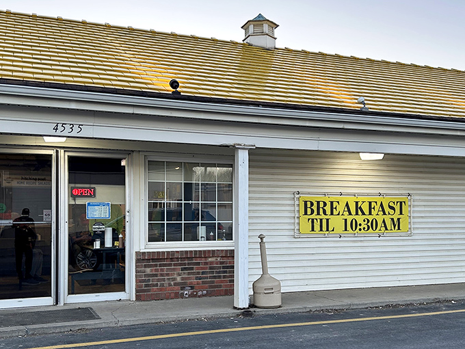The unassuming yellow roof and "BREAKFAST TIL 10" sign promise no frills, just honest food that keeps Cincinnati coming back for decades.