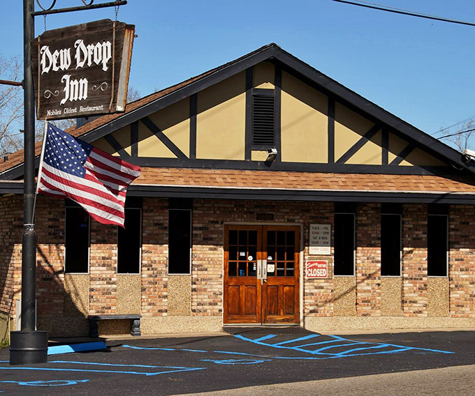 That Tudor-style roof and brick exterior hide culinary secrets that Mobile residents have been guarding for generations.