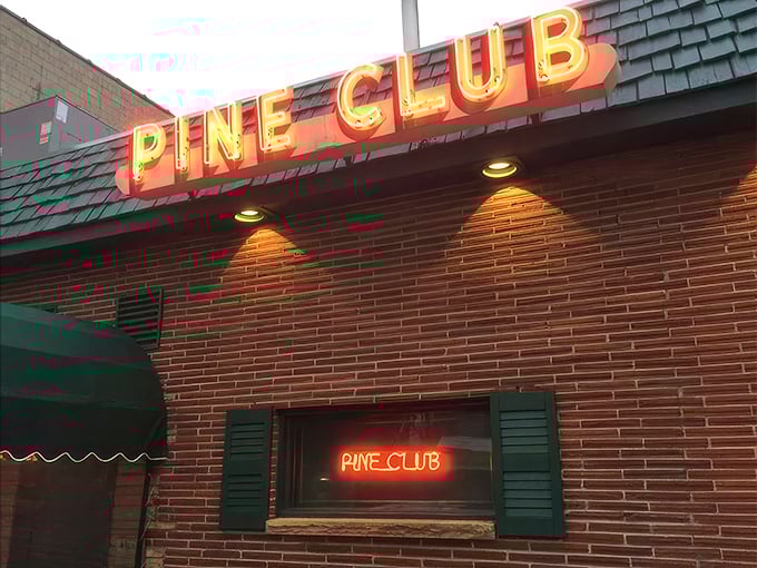 The neon glow of Pine Club's sign has been beckoning hungry Daytonians for decades, a red-lit promise of carnivorous delights within.