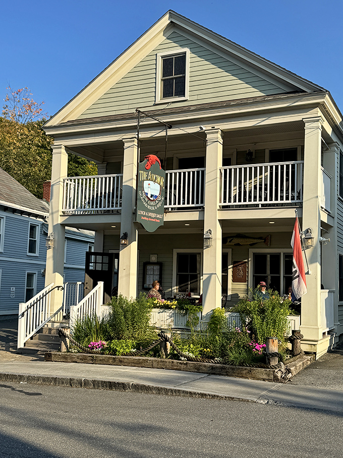The Anchor's charming colonial exterior stands like a beacon of seafood hope in landlocked Vermont, promising maritime delights with every weathered wooden step.