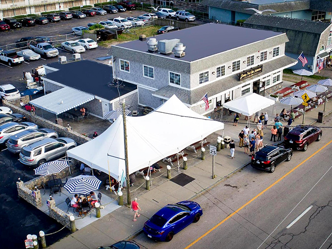 Jimmy's Port Side commands the Narragansett shoreline like a shingled fortress of seafood delights, complete with tented outdoor seating.