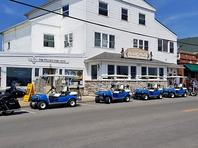 The Village Pump stands ready for action with its fleet of blue chariots &ndash; island transportation that tops out at the breakneck speed of 'delightfully leisurely.