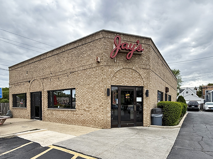 The iconic brick exterior of Jay's Beef in Harwood Heights stands like a temple to Chicago's sandwich culture, that red script sign beckoning hungry pilgrims from miles around.
