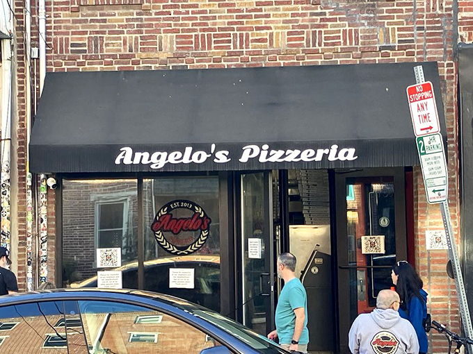 The unassuming storefront that launched a thousand food pilgrimages. Angelo's black awning signals you've arrived at cheesesteak nirvana.