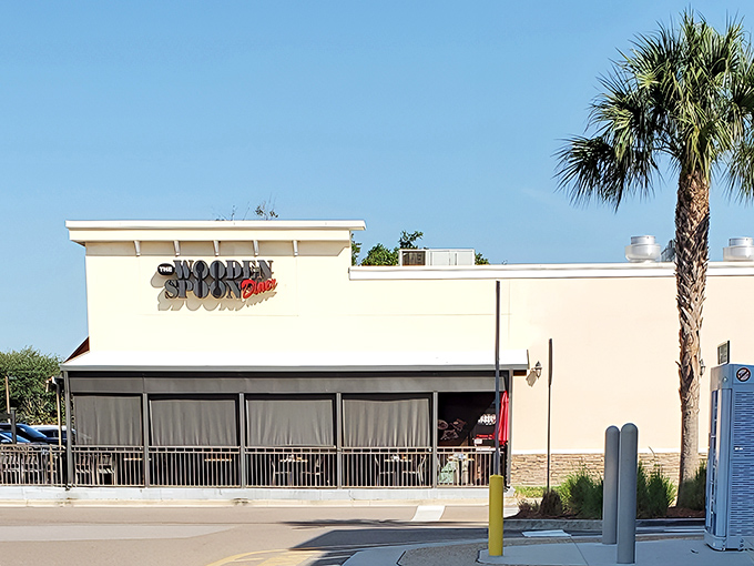 The unassuming exterior of The Wooden Spoon Diner stands like a breakfast beacon in Brandon, promising comfort food without the fanfare.
