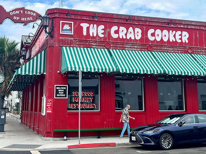 Like a maritime stoplight commanding "Stop and eat seafood now!" The Crab Cooker's unmistakable red exterior has been beckoning hungry Newport Beach visitors for generations.