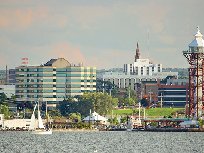 Downtown Erie unfolds like a postcard from above, with marinas flanking the central corridor and Lake Erie's vastness stretching beyond the horizon.