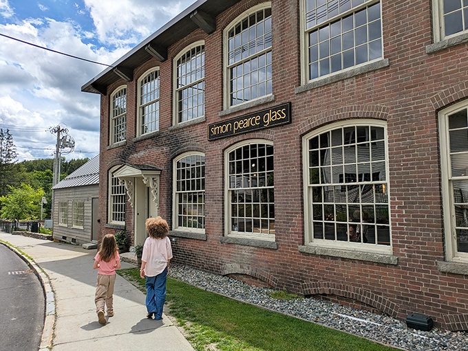 The historic brick exterior of Simon Pearce beckons like an old friend, promising culinary adventures within its storied walls.