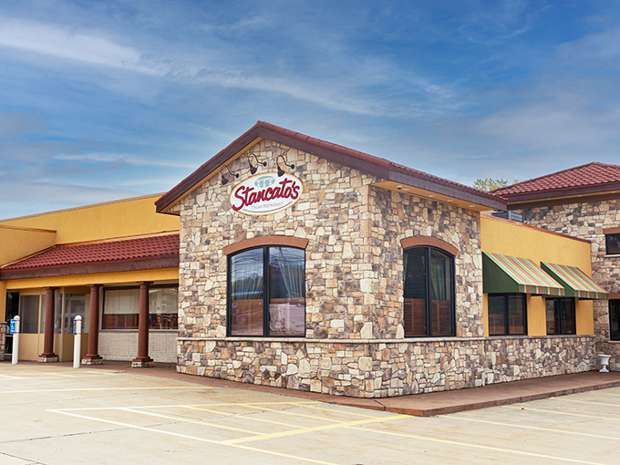 Stancato's stone facade welcomes hungry visitors like a Tuscan villa that somehow landed in Ohio. The warm yellow walls and rustic stonework promise Italian comfort inside.