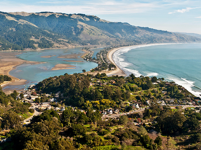 Bolinas from above reveals its best-kept secret: a perfect horseshoe bay where the lagoon meets the sea, nature's own infinity pool.