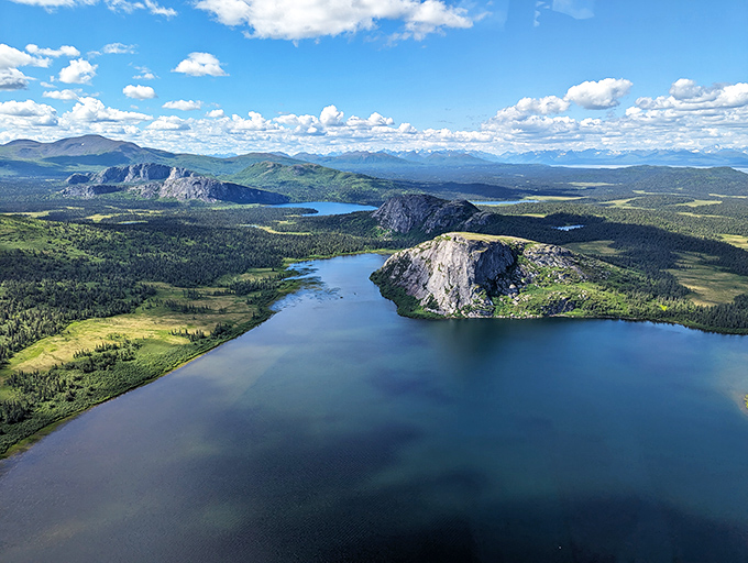 Nature's perfect campsite doesn't exi&mdash; Oh wait, there it is! Yellow tent perched between pristine waters and majestic peaks, the ultimate Alaskan alarm clock view.