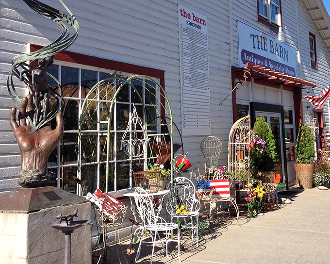 The white clapboard exterior of The Barn beckons with vintage garden furniture and whimsical metal sculptures&mdash;a Colorado treasure hunt waiting to begin.