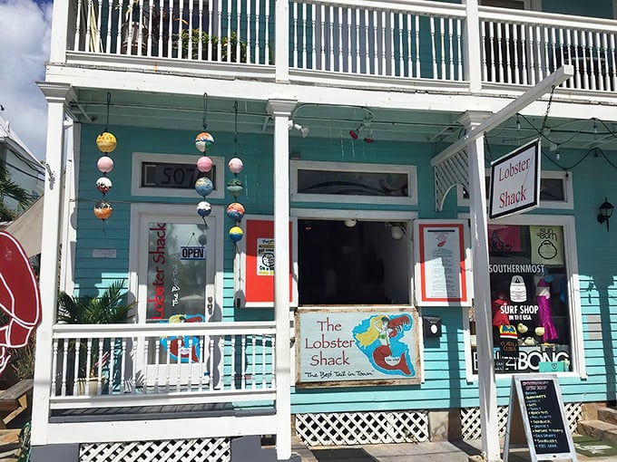 The turquoise facade of The Lobster Shack is like Key West itself—bright, cheerful, and promising good times ahead. No pretension, just seafood perfection.