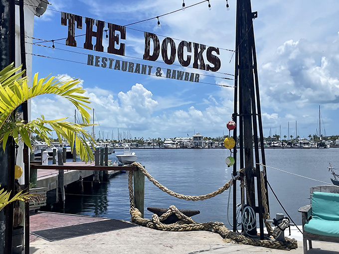 The entrance to paradise isn't pearly gates&mdash;it's this weathered sign framing a postcard-perfect view of Key West's harbor. Nautical bliss awaits.