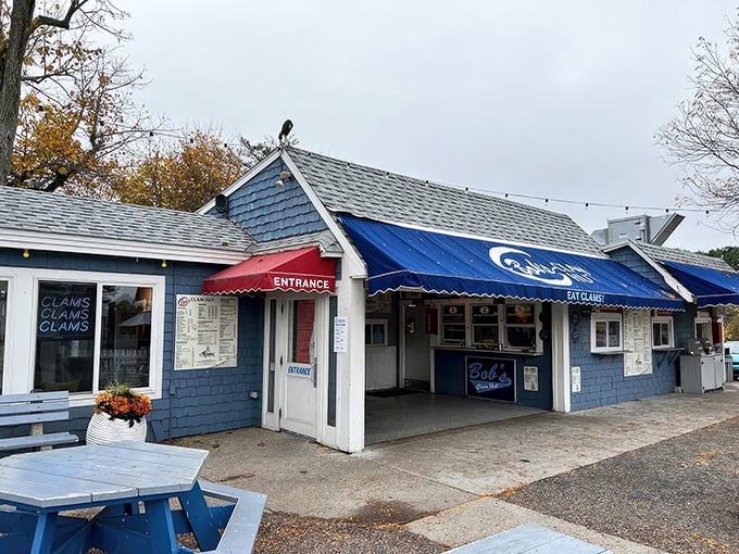 The iconic blue shack of Bob's Clam Hut stands proudly in Kittery, beckoning seafood lovers with its unpretentious charm and legendary clams.