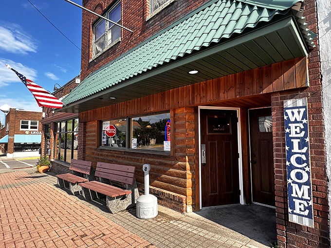 The classic brick exterior of Britton's Café welcomes you like an old friend, complete with wooden benches perfect for post-pancake people-watching.