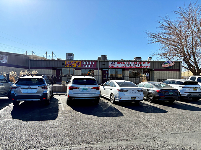 The bright sign of Vic&rsquo;s Daily Cafe stands out like a beacon of breakfast comfort in an Albuquerque strip mall, promising hearty meals without the fuss.