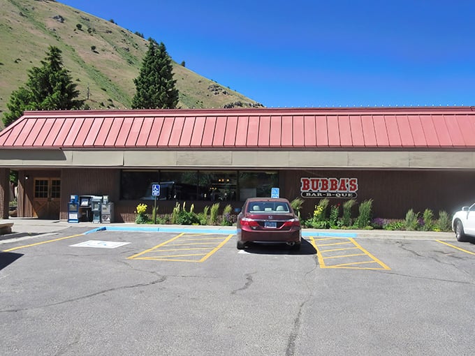 Nestled against Wyoming's rolling hills, Bubba's red-roofed sanctuary of smoke stands like a barbecue beacon, promising delicious redemption for hungry travelers.