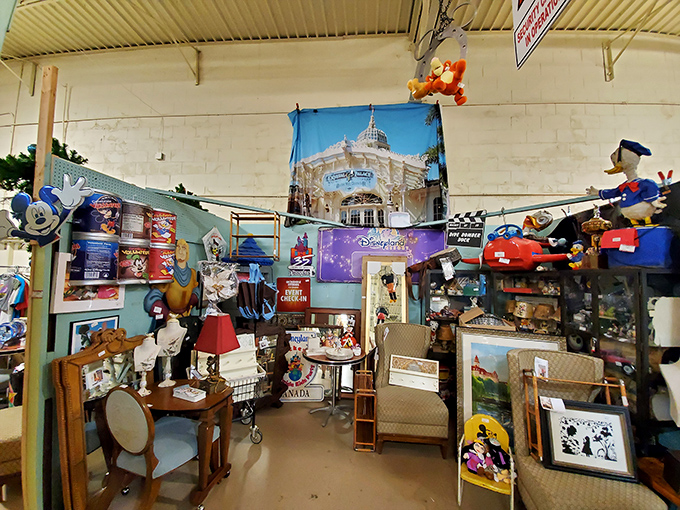 A Disney collector's paradise awaits inside the Lakeland Antique Mall, where childhood nostalgia meets vintage memorabilia in a colorful display.